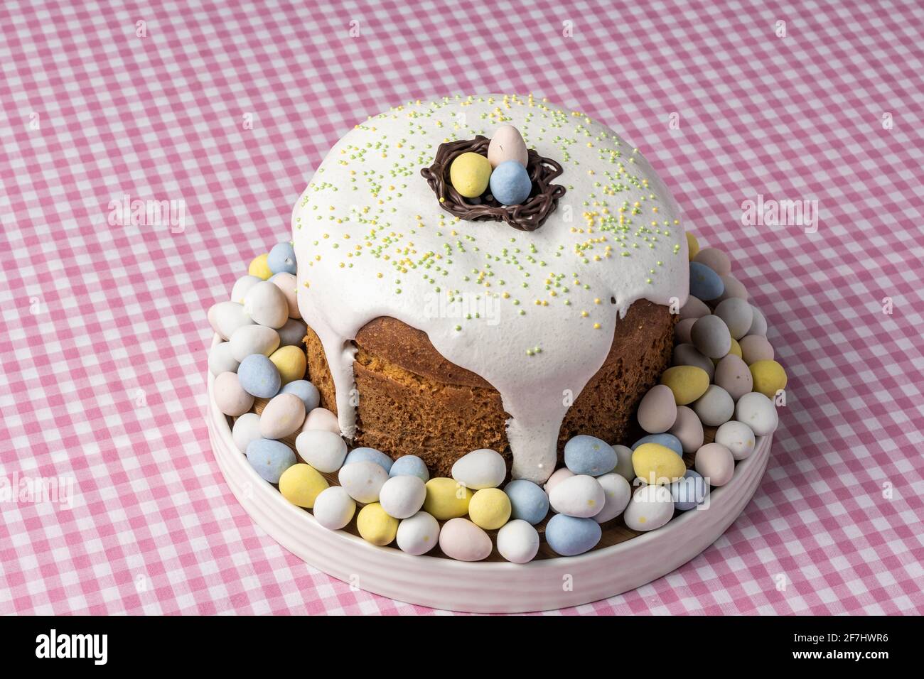 Traditional Easter cake or sweet bread and eggs decorated homemade ...