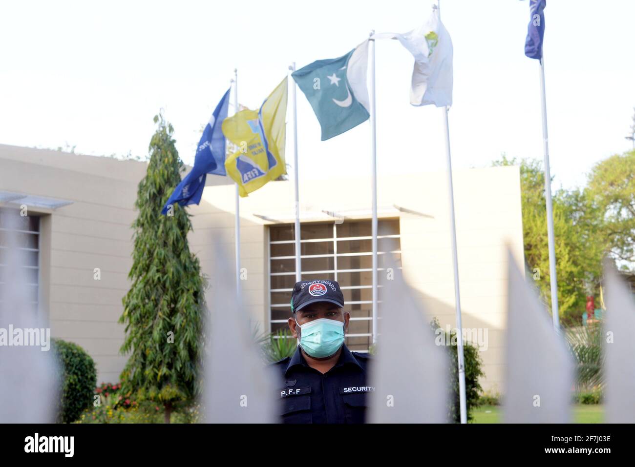 A security guard stands at the main entrance of the headquarters of ...