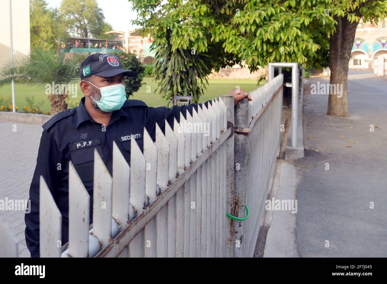 A security guard stands at the main entrance of the headquarters of ...