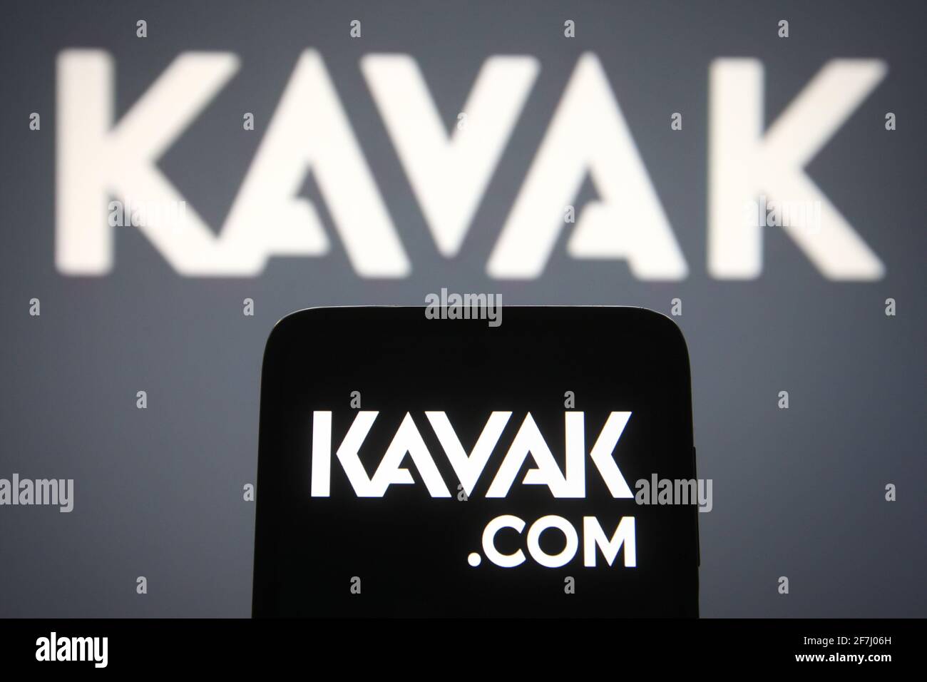 In this photo illustration the Kavak logo is seen on a smartphone and a ...