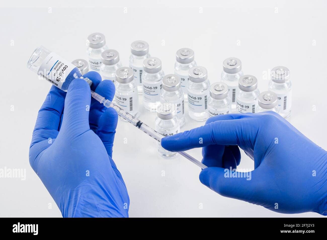 covid 19 vaccine, white background Stock Photo - Alamy