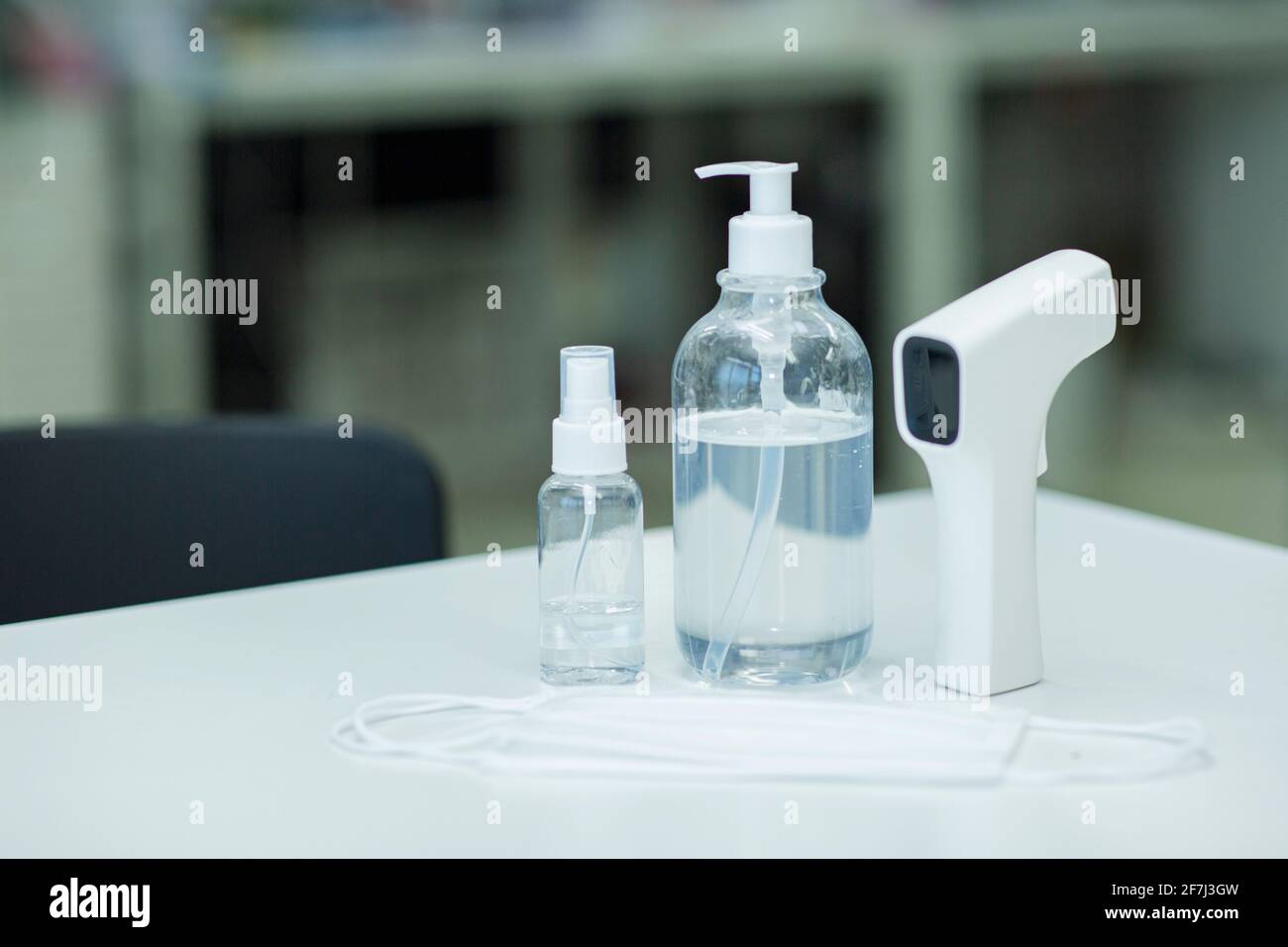 hand sanitizer and thermometer Stock Photo - Alamy