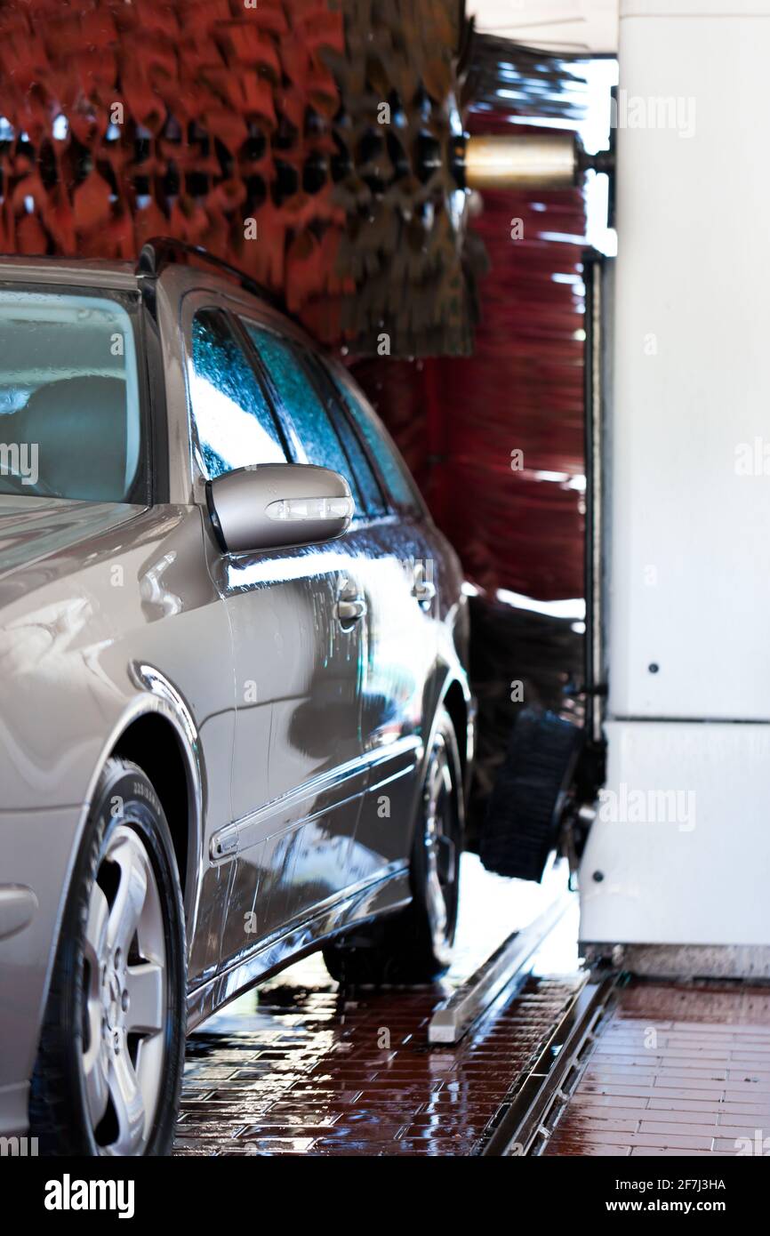 Car standing in a car wash Stock Photo - Alamy