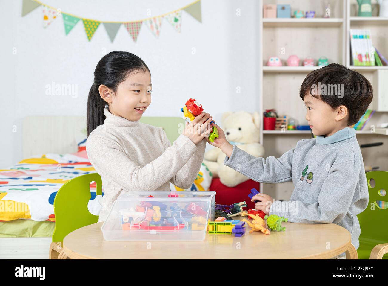 Fight over toy hi-res stock photography and images - Alamy