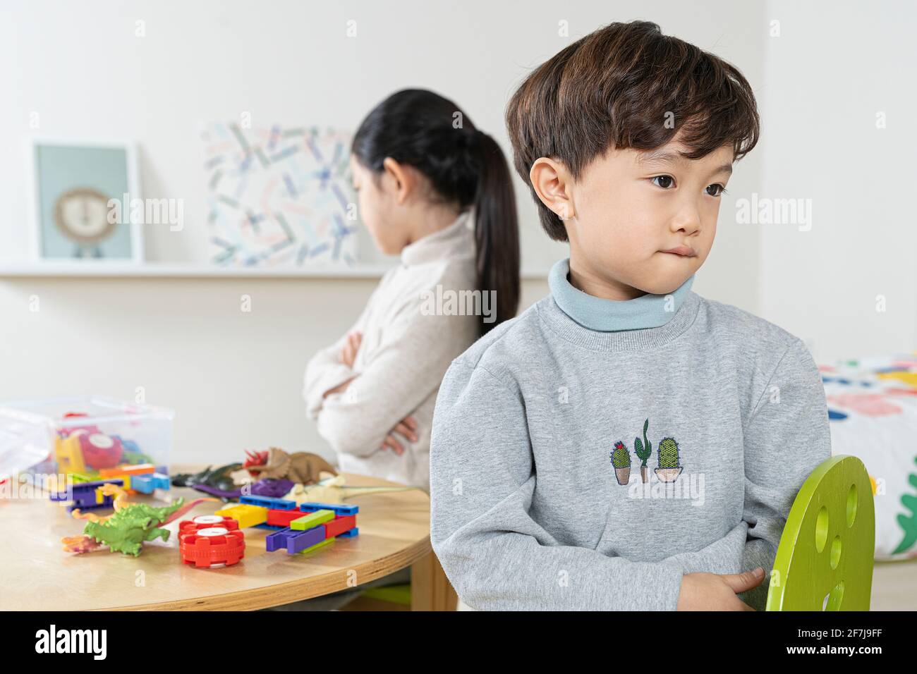 Asian girl and boy, sister and brother fighting over toy Stock Photo ...
