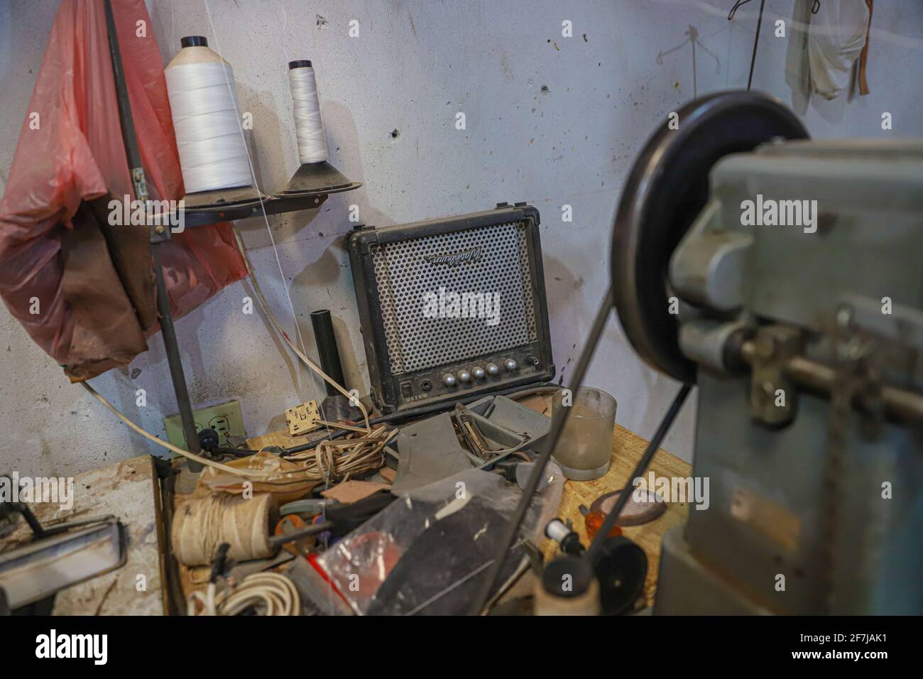 Sewing machine in the factory of boots, saddlery, footwear and leather ...