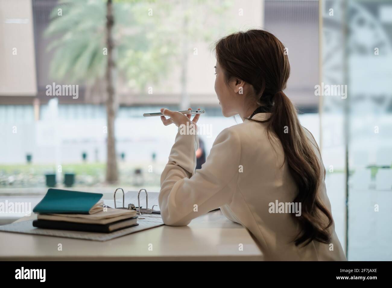 Business owner talking with customers by cell phone for confirm big ...