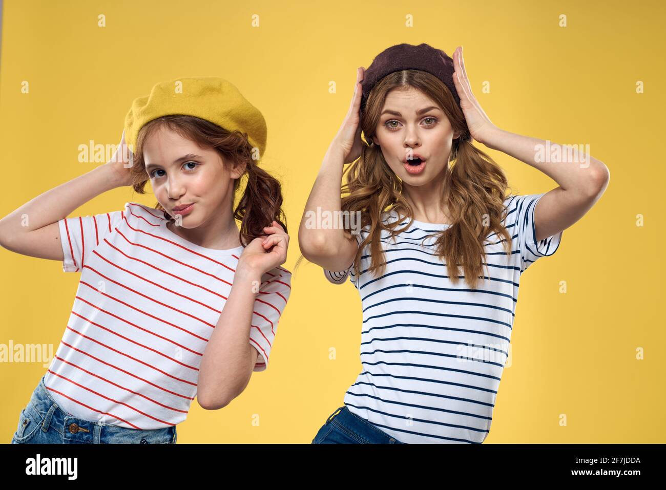 funny mom and daughter fashion clothes studio lifestyle yellow ...