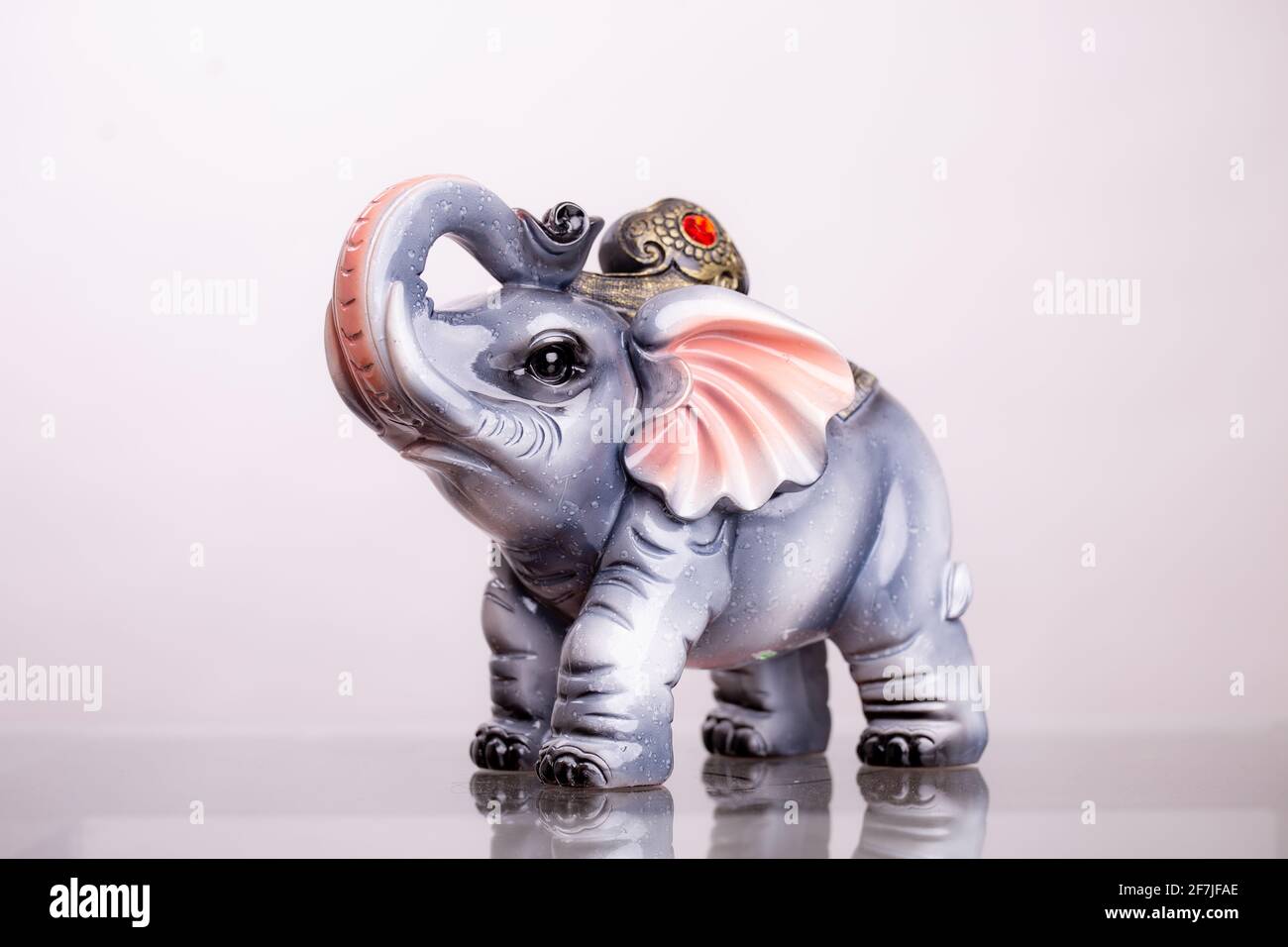 Feng shui elephant figure isolated on white background Stock Photo - Alamy