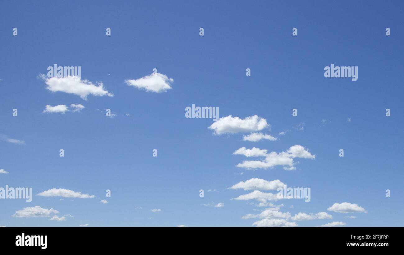 Sky blue small white cumulus cloud hi-res stock photography and images ...