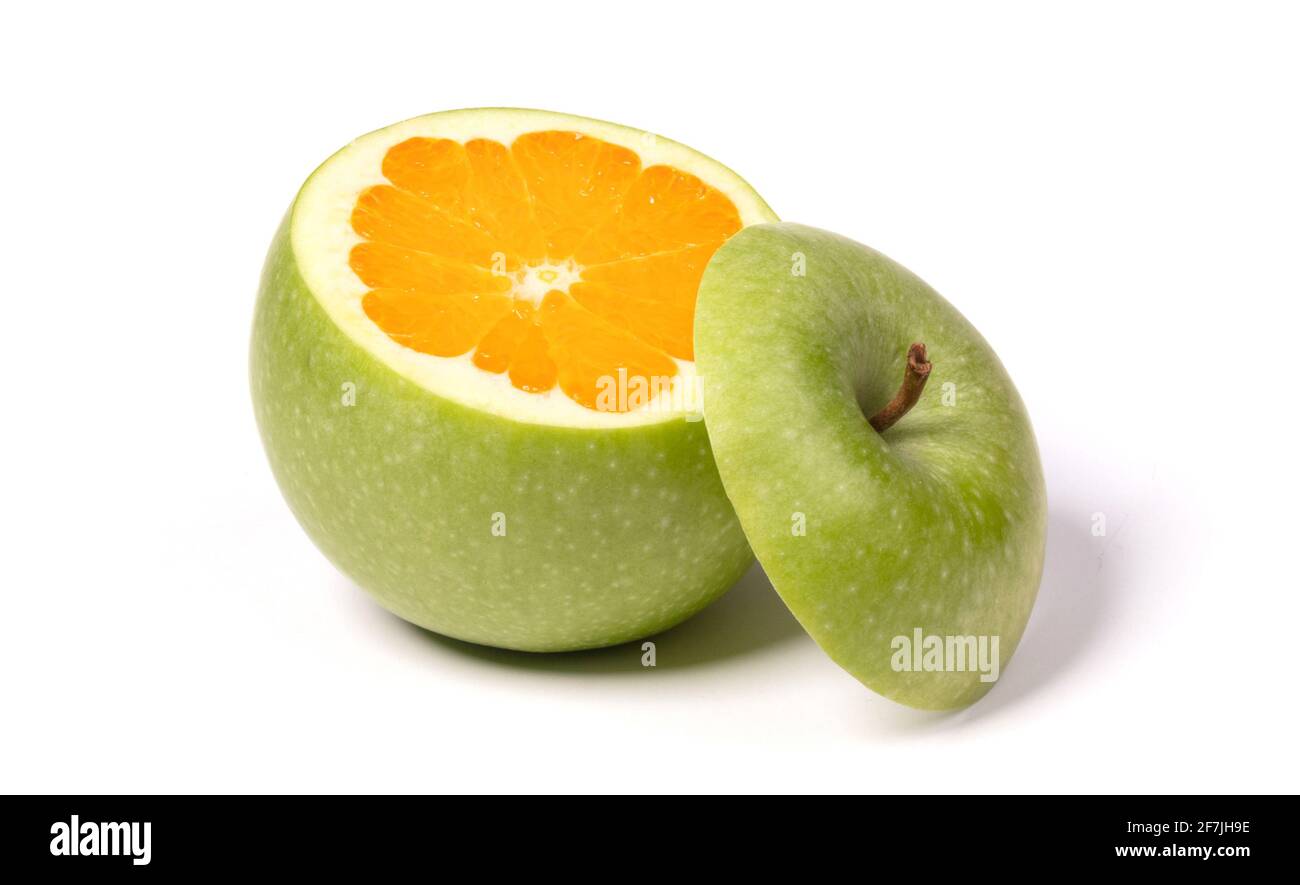 Green apple with orange inside, isolated on white Stock Photo - Alamy