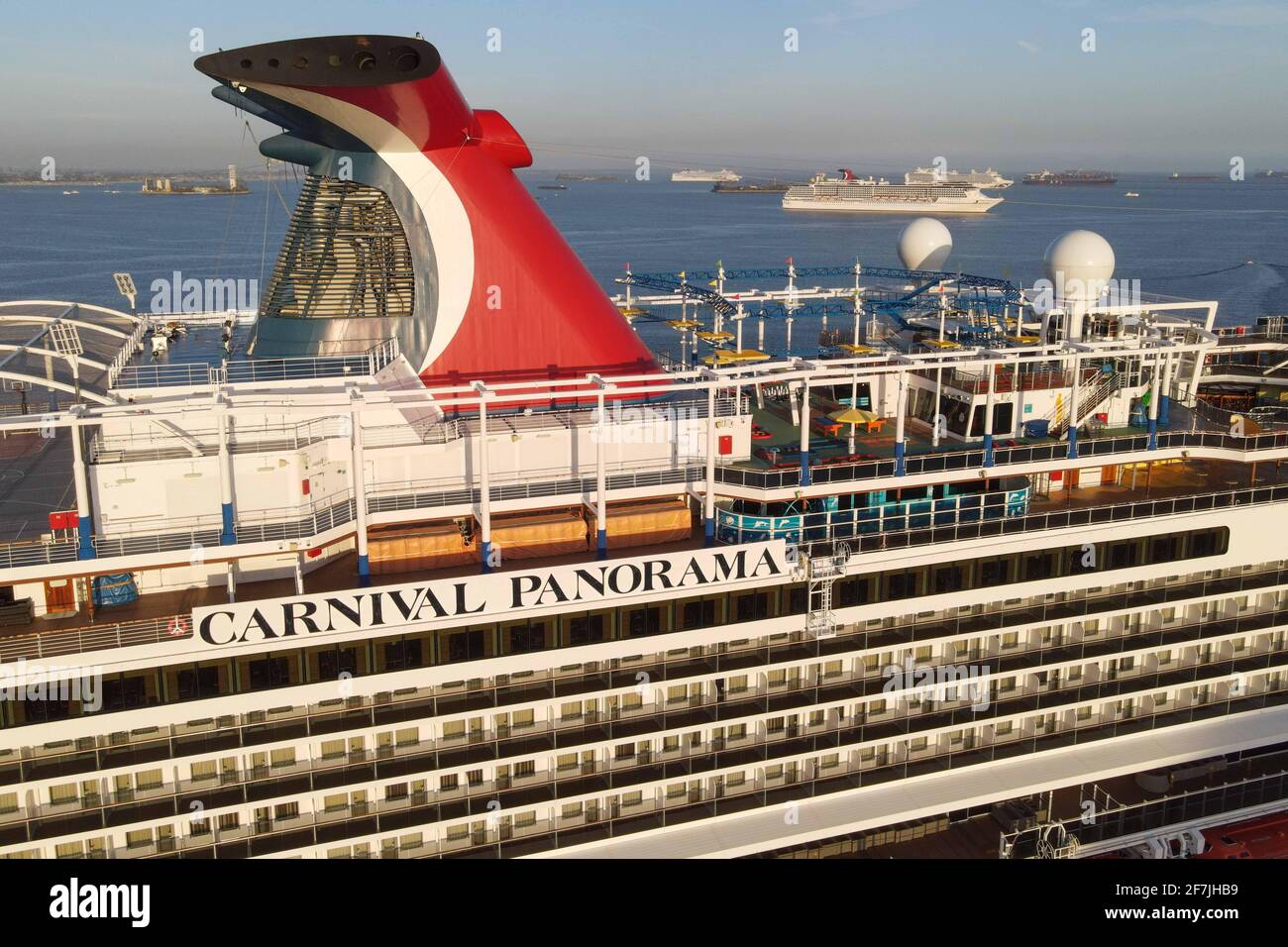 The Carnival Panorama cruise ship is docked near the Queen Mary in the ...