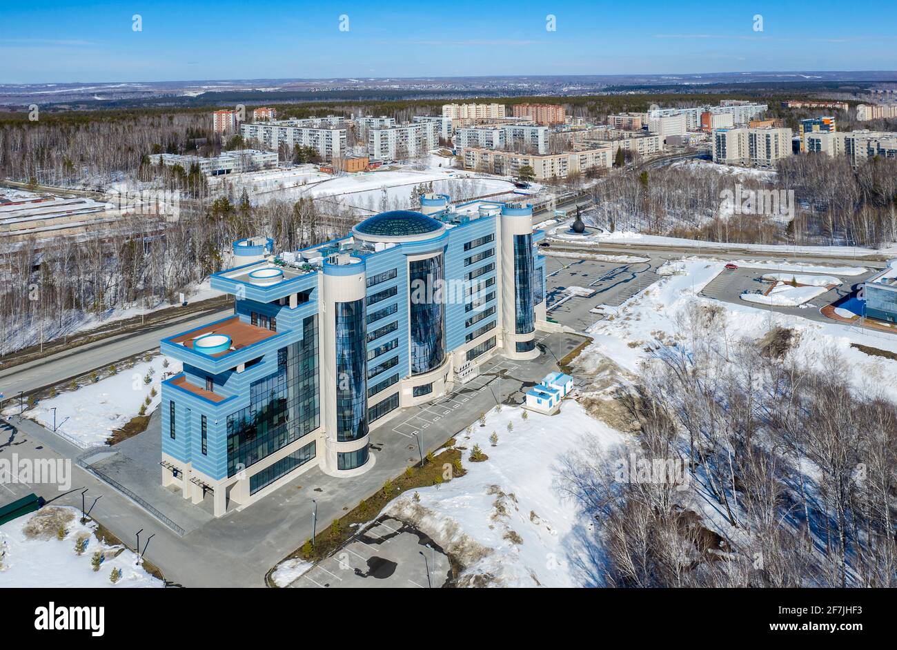 Aerial view of the modern building in the Siberian city of Koltsovo ...