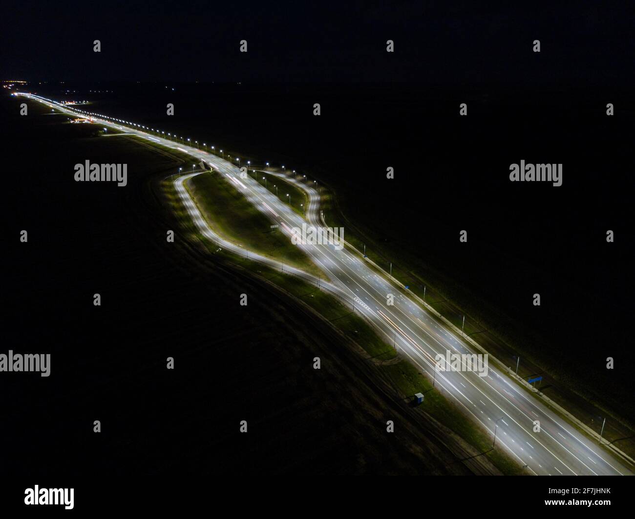 Night roads panoramic background, bird eye view on illuminated highway ...