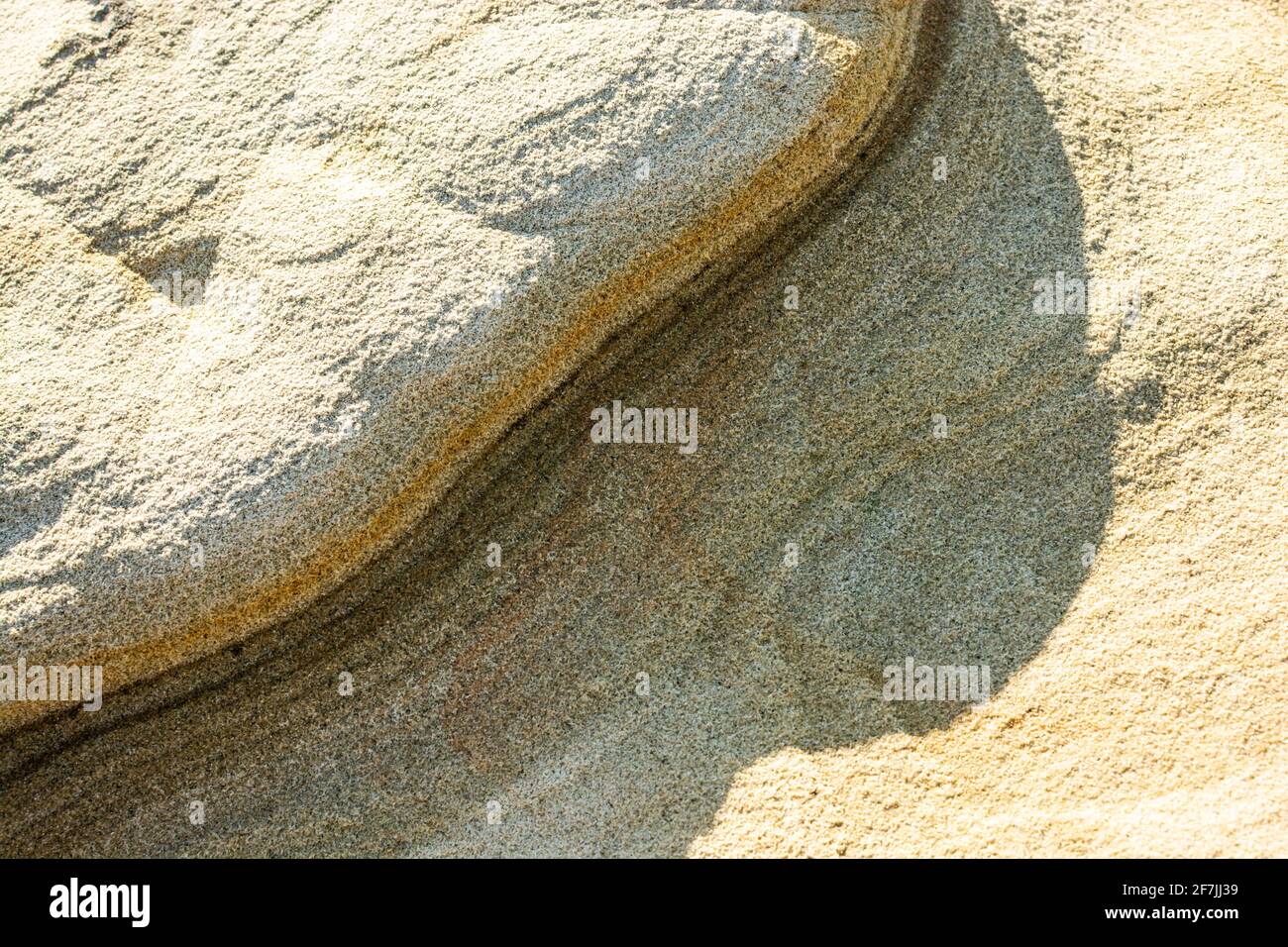 Rock formations of sandstone and other materials on the coast of the ...