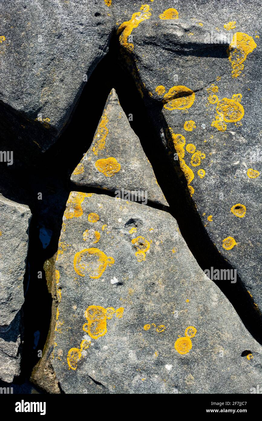 A-shaped crack.Rock formations of sandstone and other materials on the ...