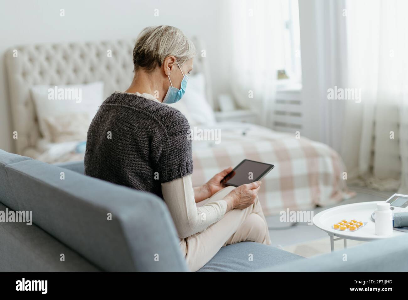 female patient using digital tablet in medical office Stock Photo - Alamy