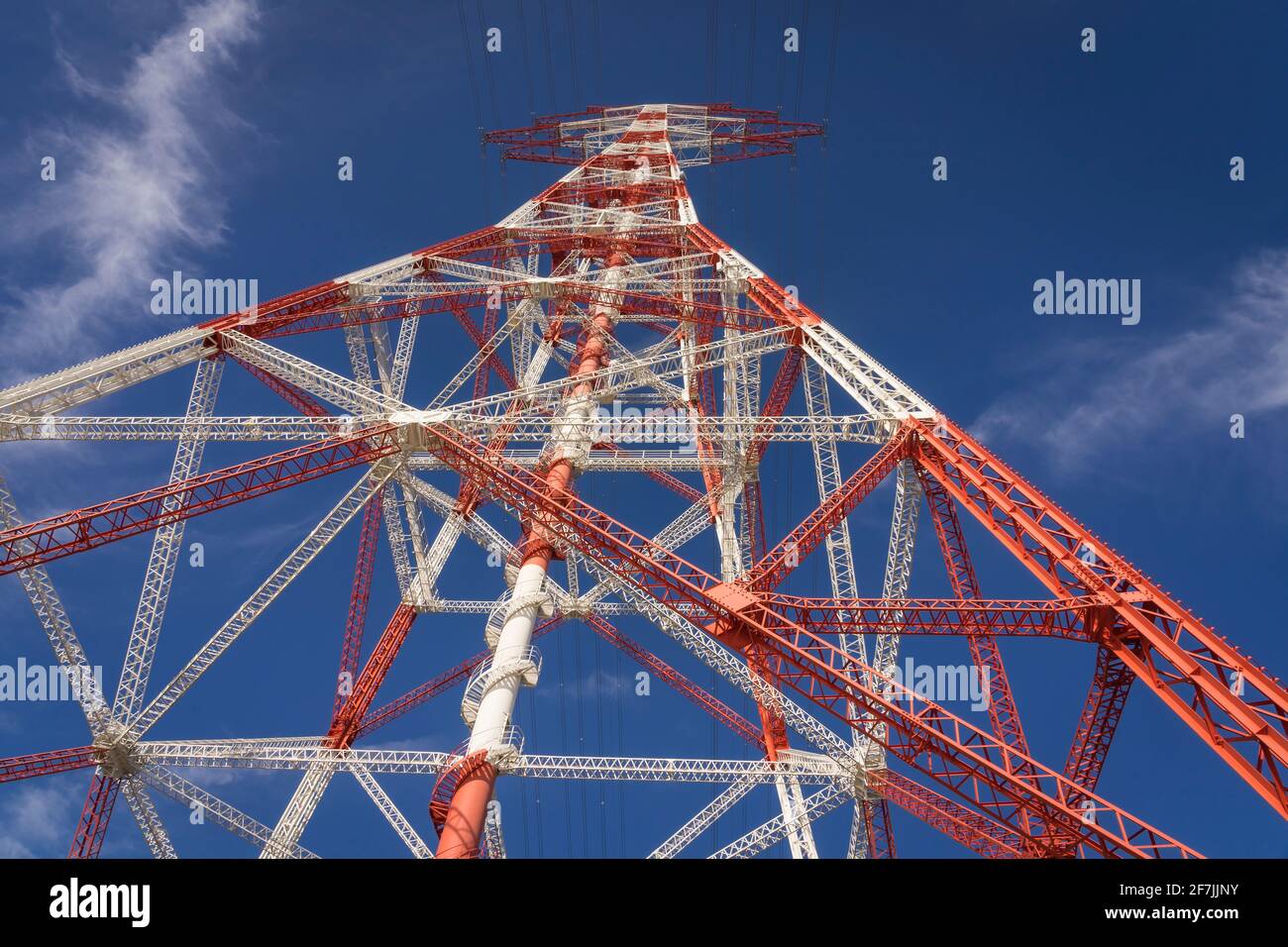 power grid pylon painted in signal colers Stock Photo - Alamy