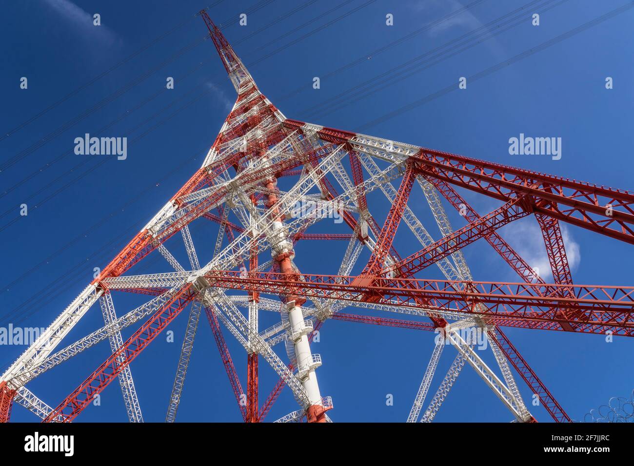 power grid pylon painted in signal colers Stock Photo - Alamy