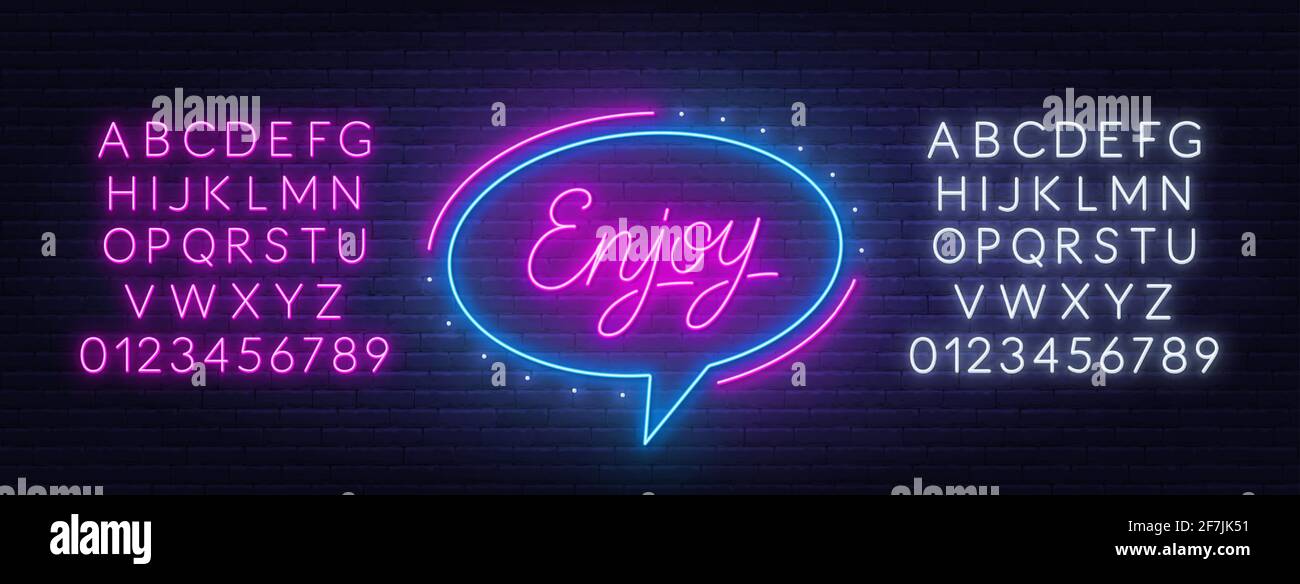 Enjoy neon glowing sign. Neon pink and white alphabet on brick wall ...