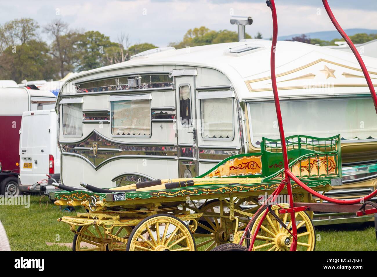 Romany gypsy traveller traditional ornate caravan and trailer at ...