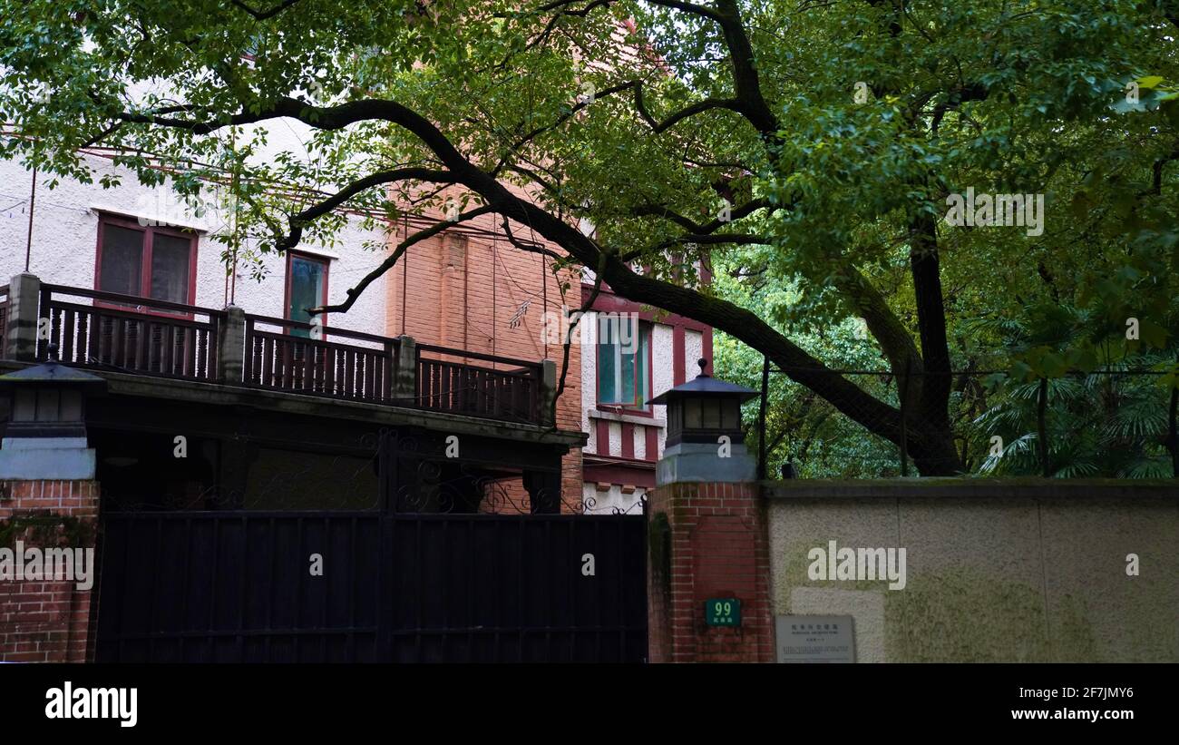 Green trees and old house in Wukang Road of Shanghai city Stock Photo ...
