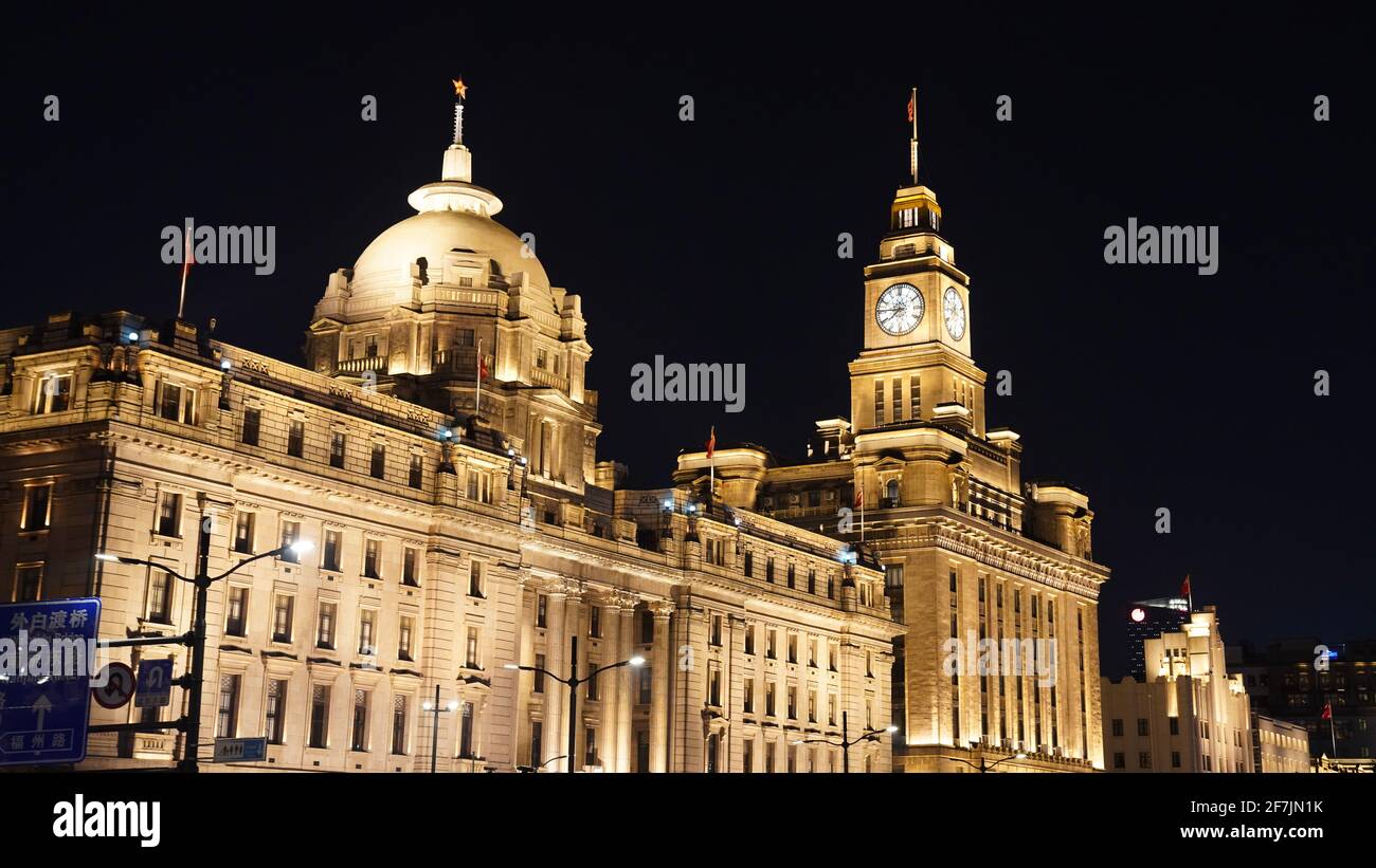Building with lights on at night in Shanghai City Stock Photo - Alamy