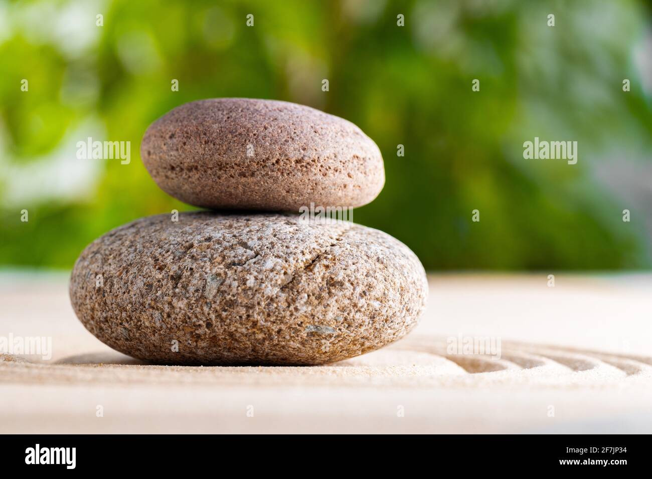 Japanese zen garden with stone in raked sand Stock Photo - Alamy