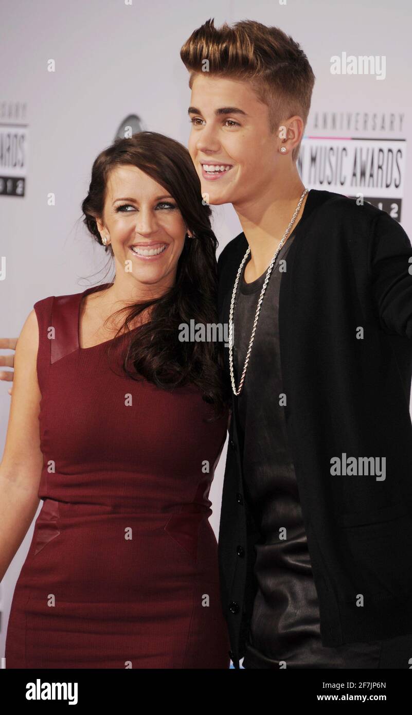 Justin Bieber attends the 40th Anniversary American Music Awards held ... Justin Bieber attends the 40th Anniversary American Music Awards held ...