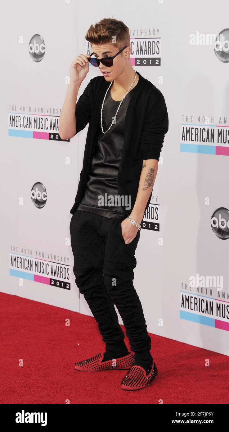 Justin Bieber attends the 40th Anniversary American Music Awards held ... Justin Bieber attends the 40th Anniversary American Music Awards held ...