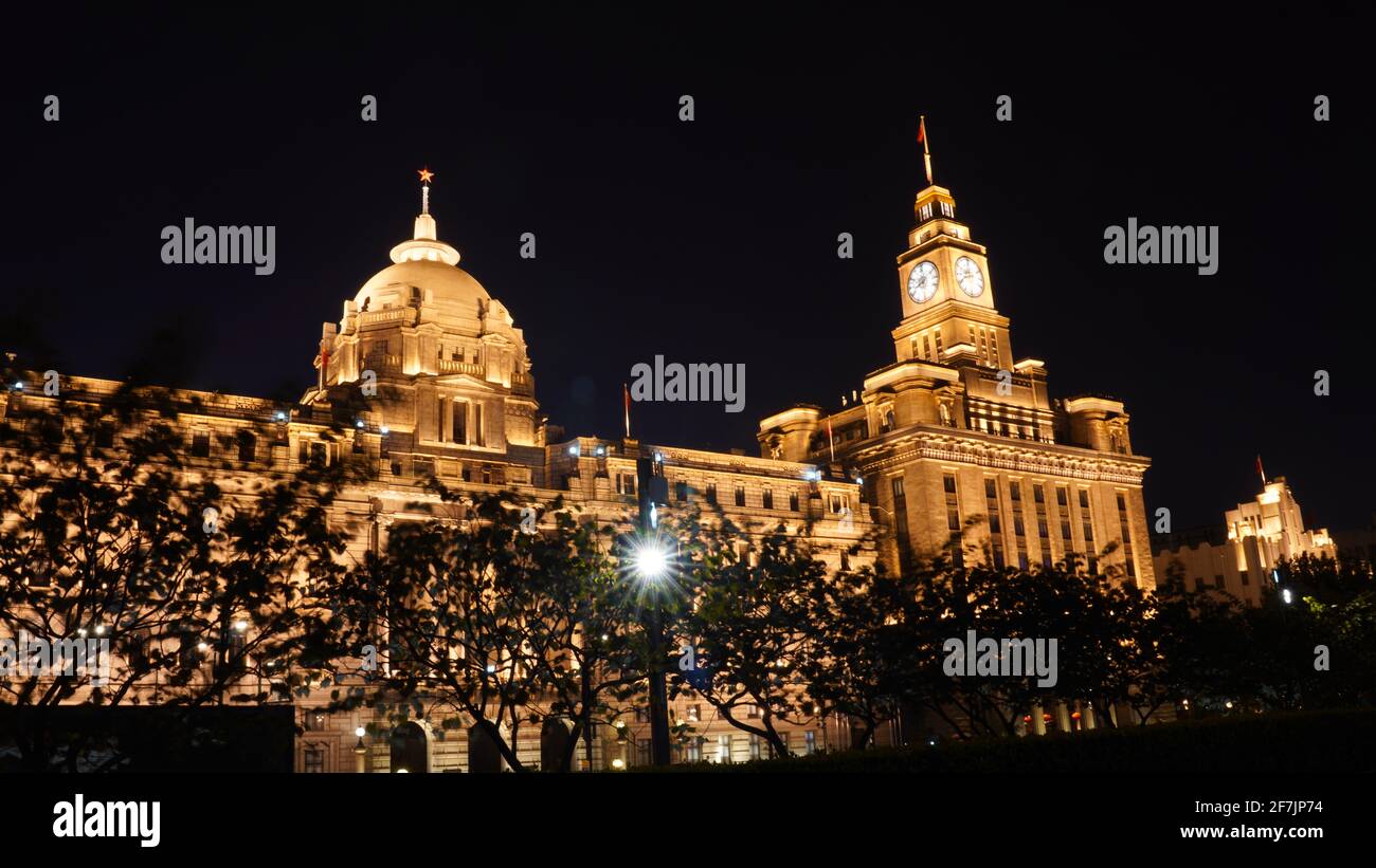 Buildings with lights on during night in Shanghai city Stock Photo - Alamy
