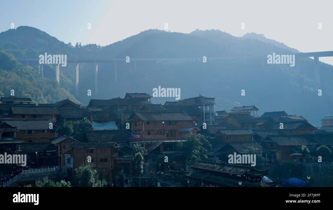 Viaduct over Hmong Village of Pheonix Town in Hunan Stock Photo - Alamy