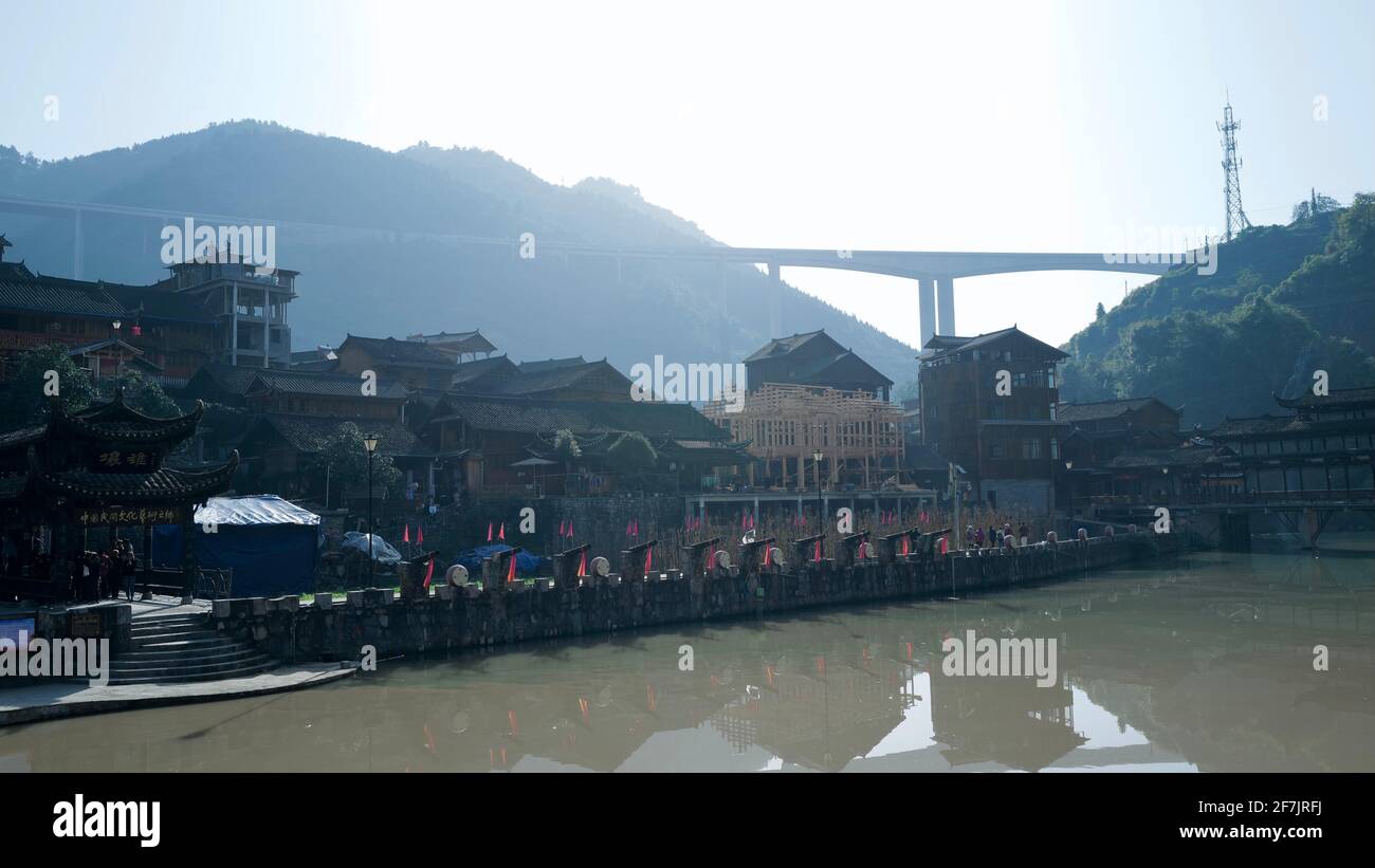 Viaduct over Hmong Village of Pheonix Town in Hunan Stock Photo - Alamy