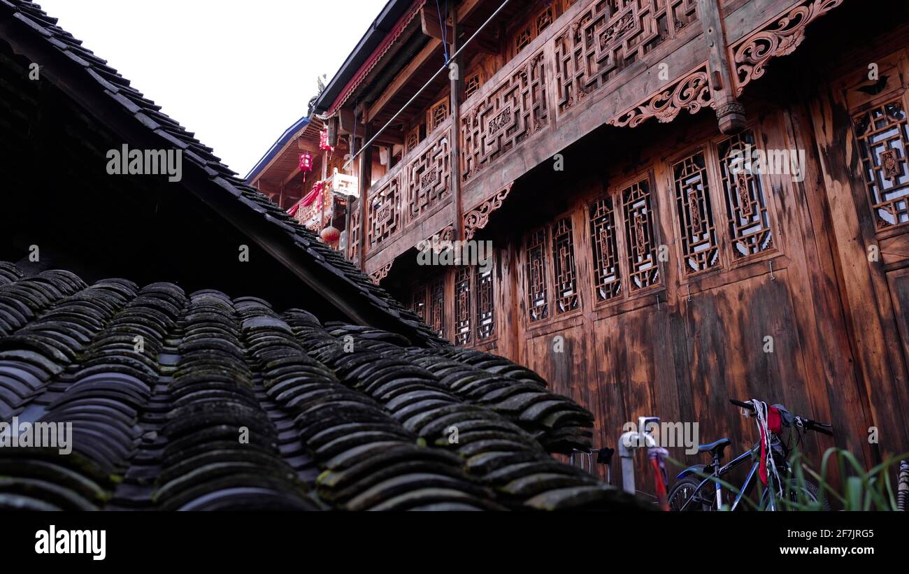 Old wooden house and tile roof Stock Photo - Alamy