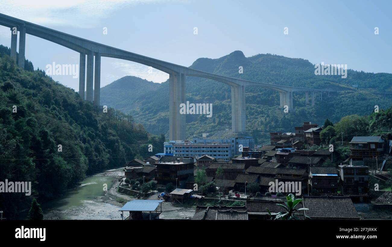 Viaduct over Hmong Village of Pheonix Town in Hunan Stock Photo - Alamy