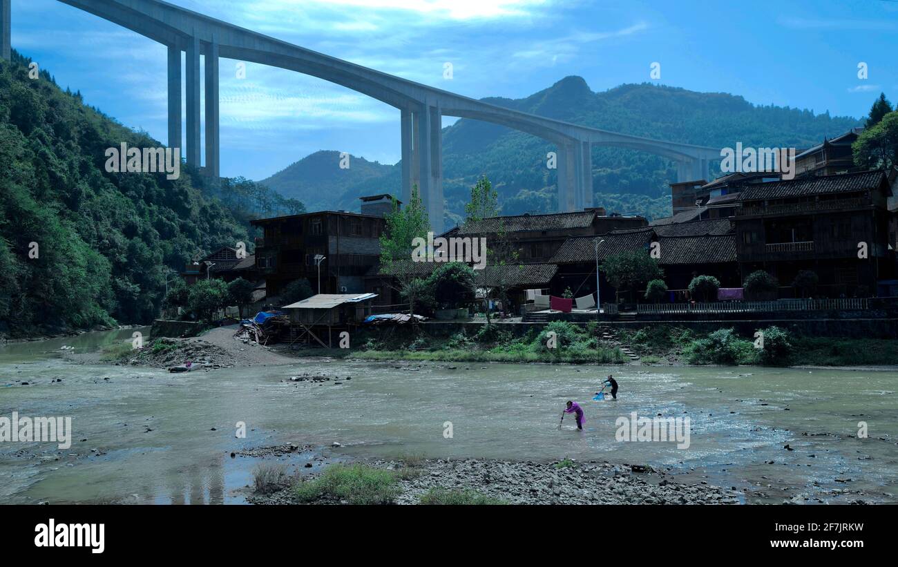 Viaduct over Hmong Village of Pheonix Town in Hunan Stock Photo - Alamy