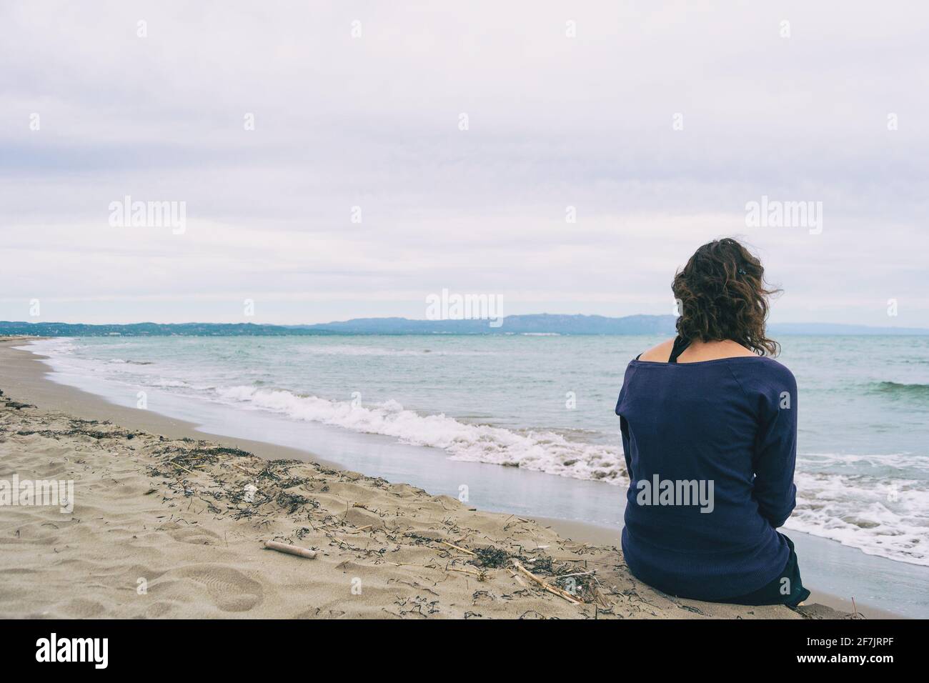 Woman unhappy at beach hi-res stock photography and images - Alamy