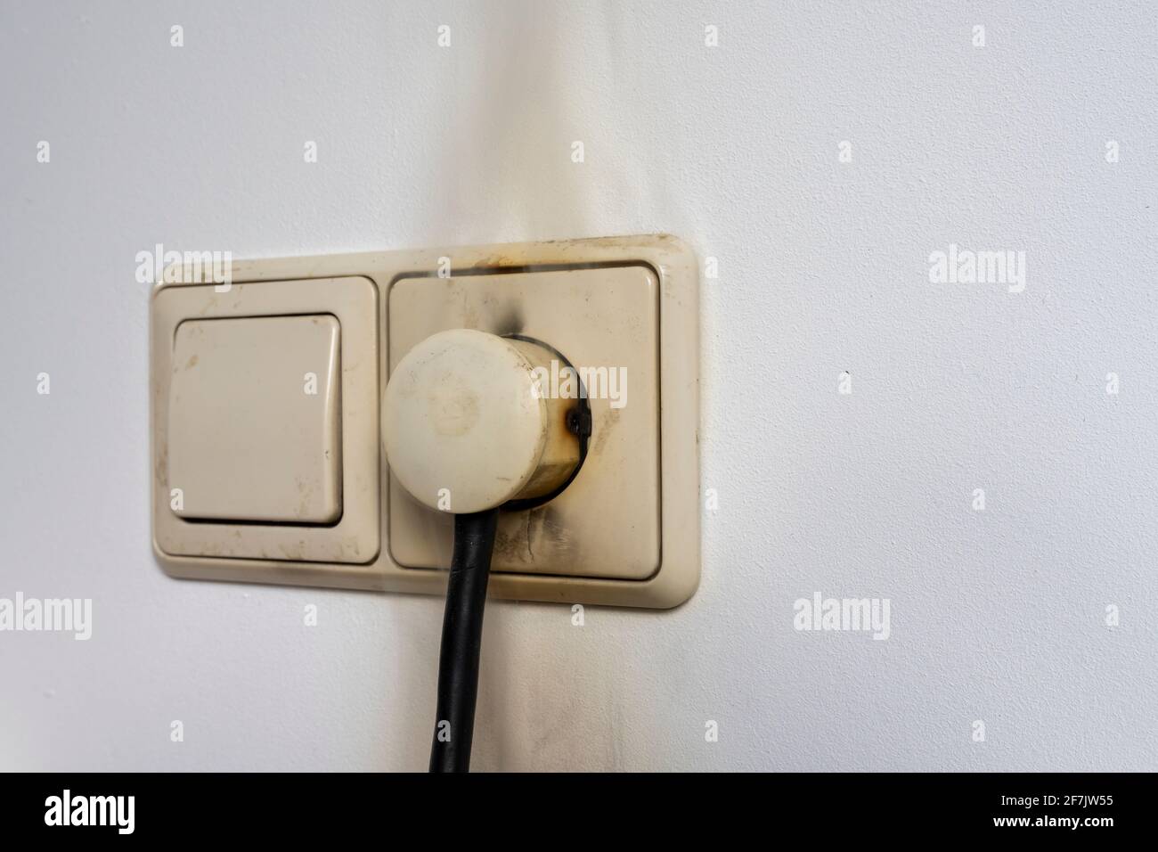 Plug socket fire hi-res stock photography and images - Alamy