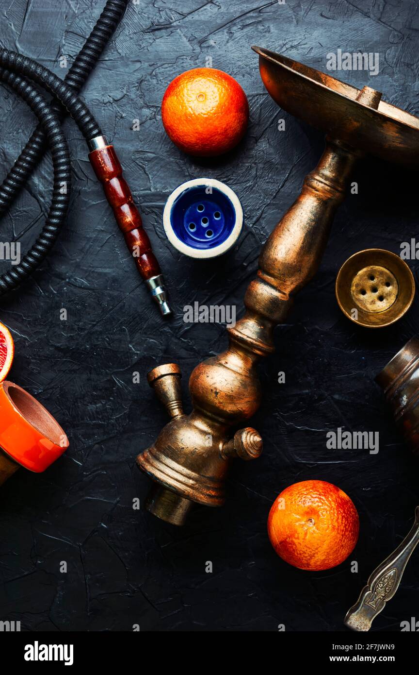 Oriental hookah or shisha with tobacco with grapefruit aroma.East ...