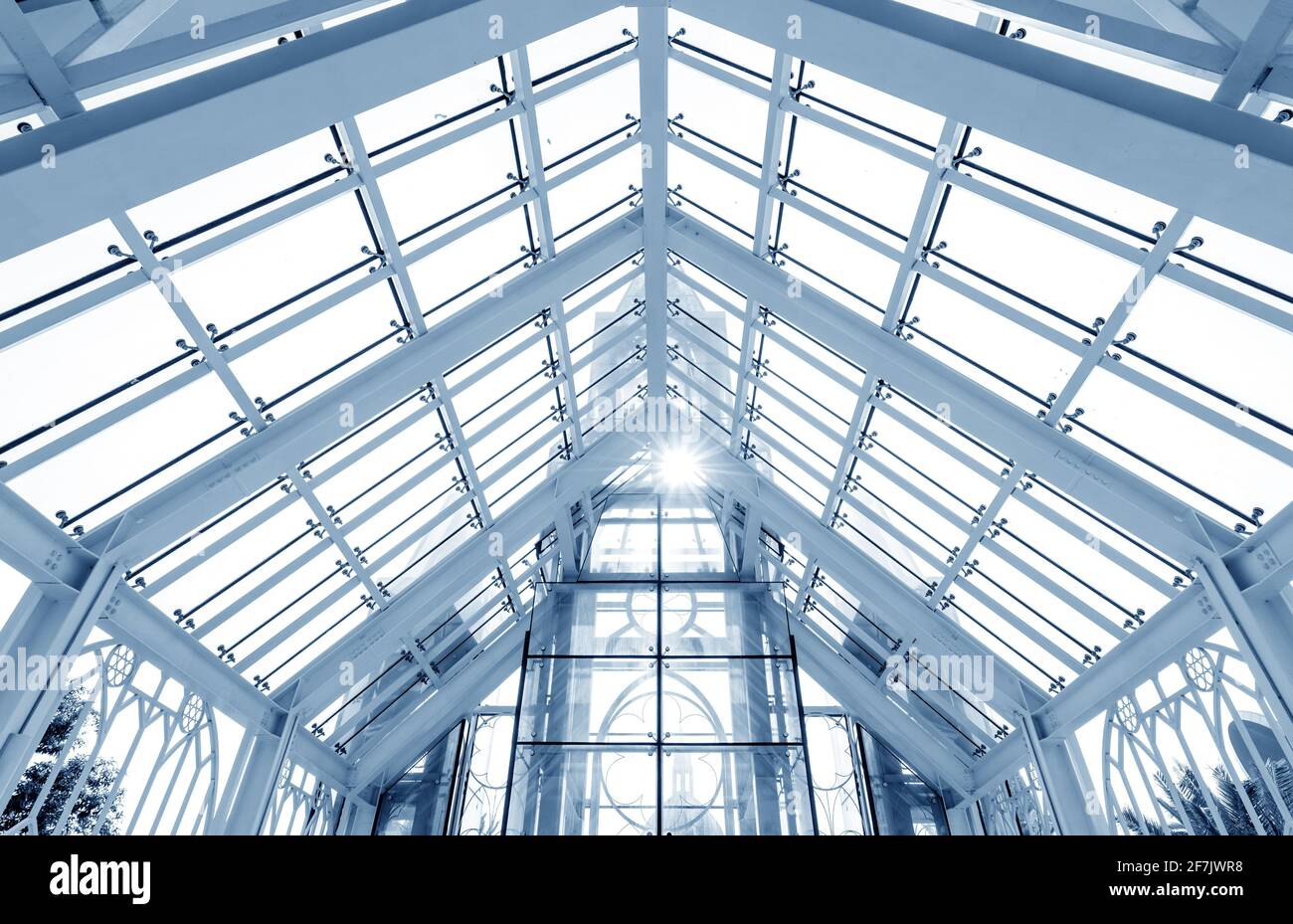 Transparent glass house in the park Stock Photo - Alamy