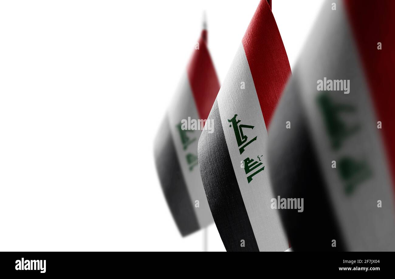 Small national flags of the Iraq on a white background Stock Photo - Alamy