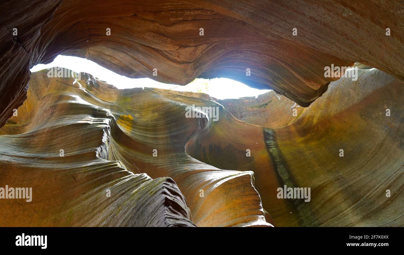 Ganquan Canyon with nature formed narrow cliff that just enough to pass ...