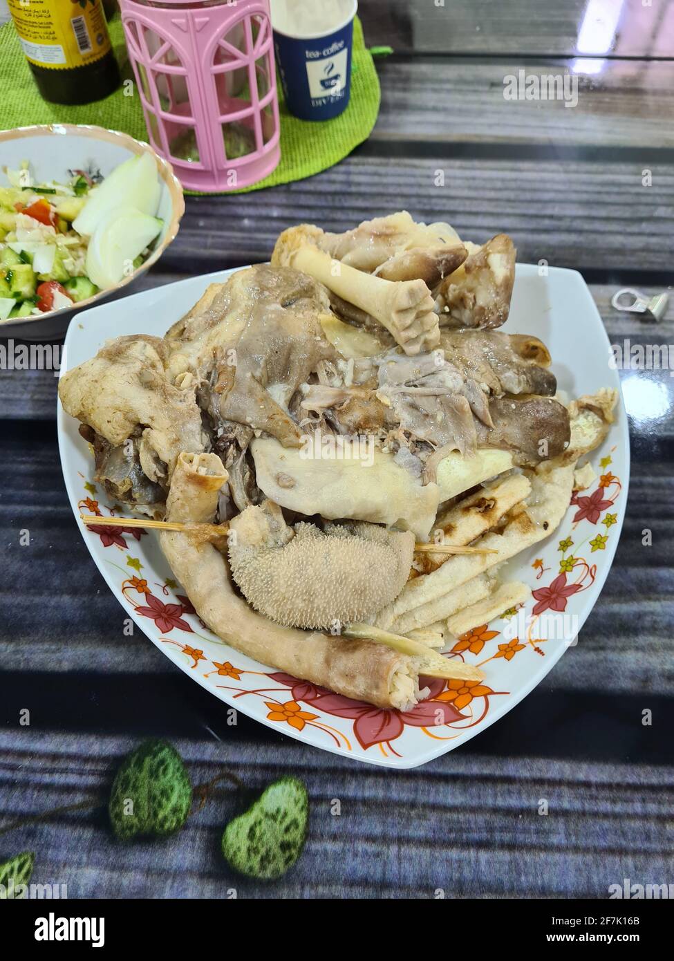 basra, Iraq - april 25, 2020: photo traditional Trotters soup dish in ...