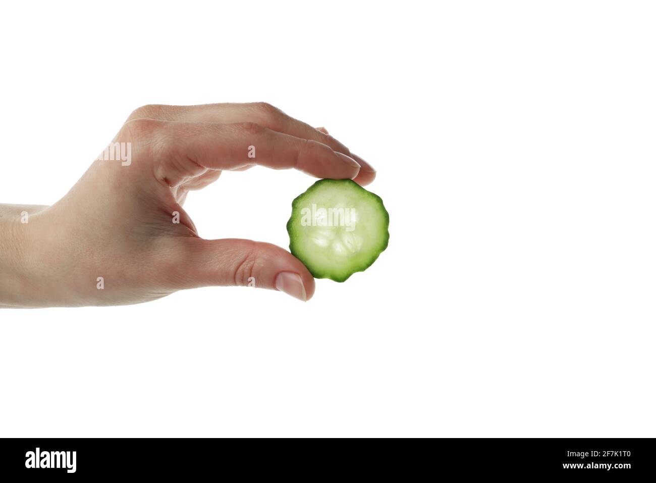 Female hand hold cucumber slice, isolated on white background Stock ...