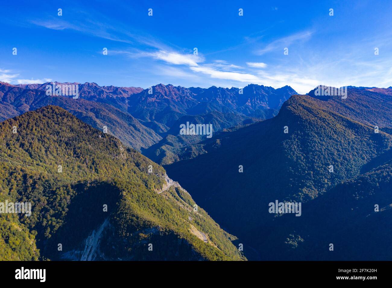 Mountains and green forest view from drone Stock Photo - Alamy