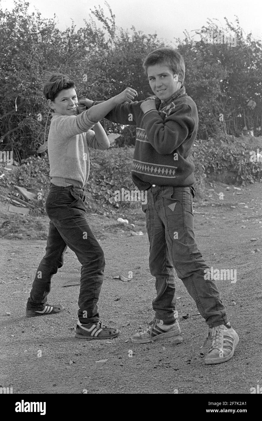 two young Travellers boys pretending to do bare-knuckle boxing, a ...
