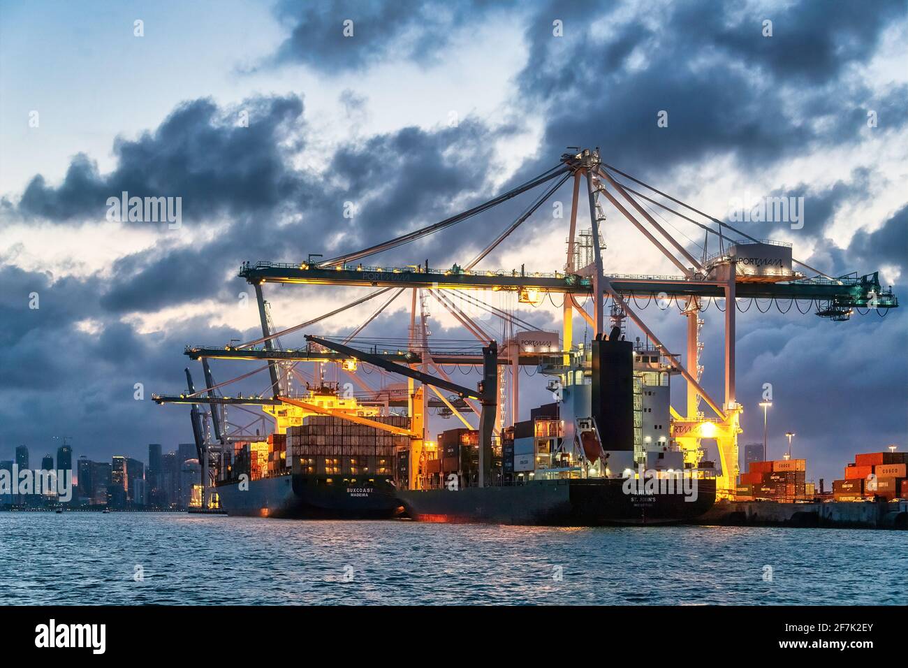 Port of Miami cranes at night, Florida, USA Stock Photo - Alamy
