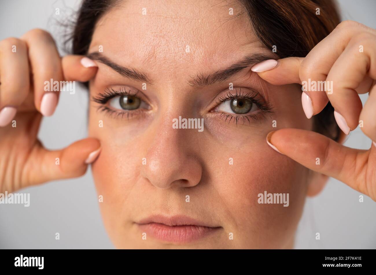 Close-up portrait of Caucasian middle-aged woman showing expression ...