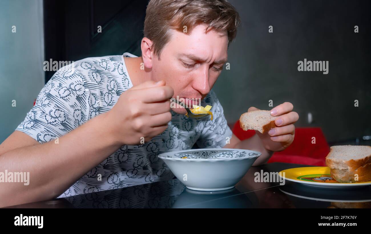 Spoon soup mouth hi-res stock photography and images - Alamy