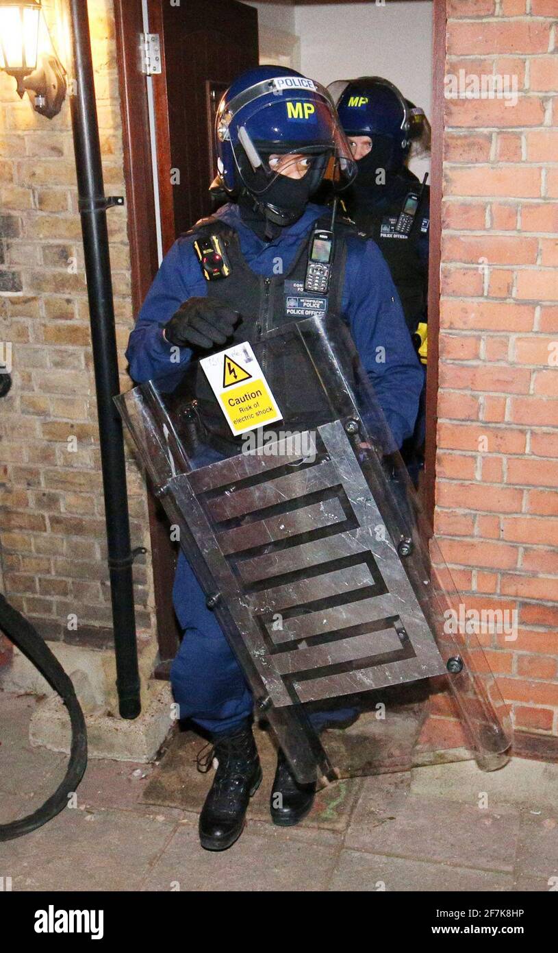 A police officer from the Territorial Support Group (TSG) carries an ...